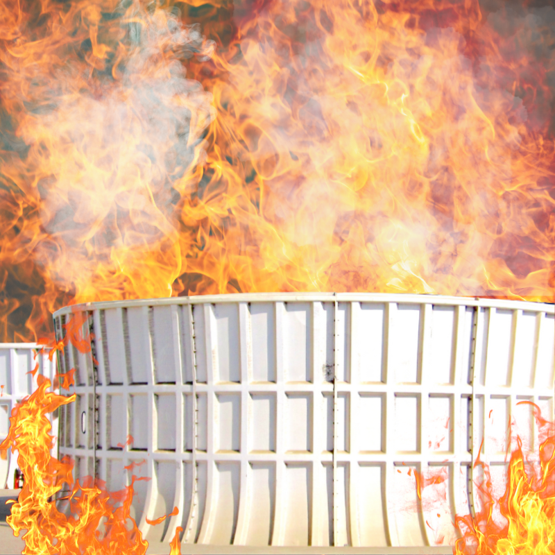 Why would a cooling tower that was completely full of water catch on fire?