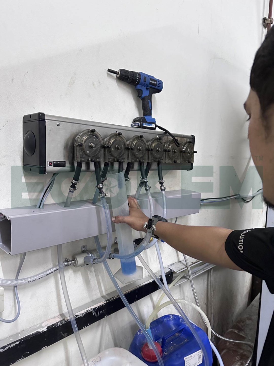 Automatic Laundry Chemical Dispensing System Installation